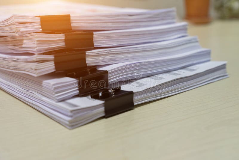 Stack of White Paperwork Achieves with Black Binder Paper Clips Stock ...