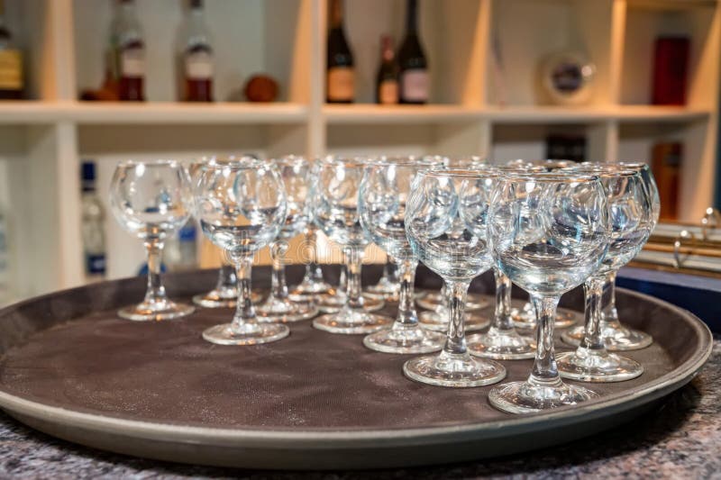 Stack of White Plates and Empty Wine Glasses Stock Photo - Image of ...