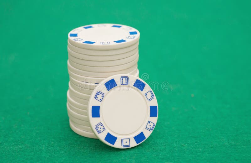 Stack of White Poker Chips on Casino Table Stock Image - Image of table ...