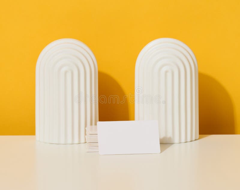 Stack of White Rectangular Business Cards on a Yellow Background ...