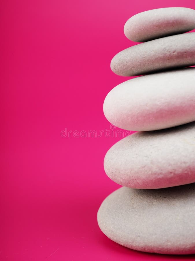 A Stack of White Zen Stones on a Pink Background, Minimalism Stock ...
