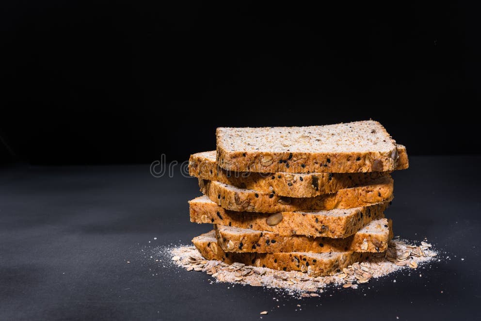 Stack of whole wheat bread stock image. Image of loaf - 158149383