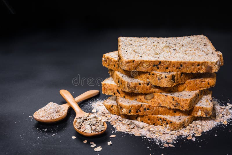 Stack of whole wheat bread stock photo. Image of loaf - 158297046