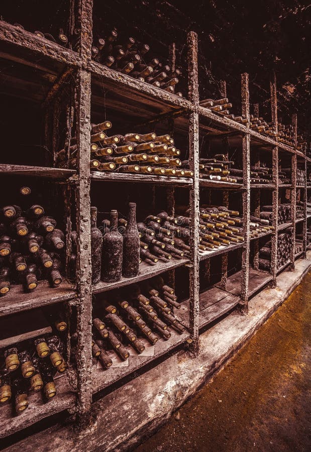 Stack of Wine Bottles in Cellar Stock Photo - Image of classic, ageing ...