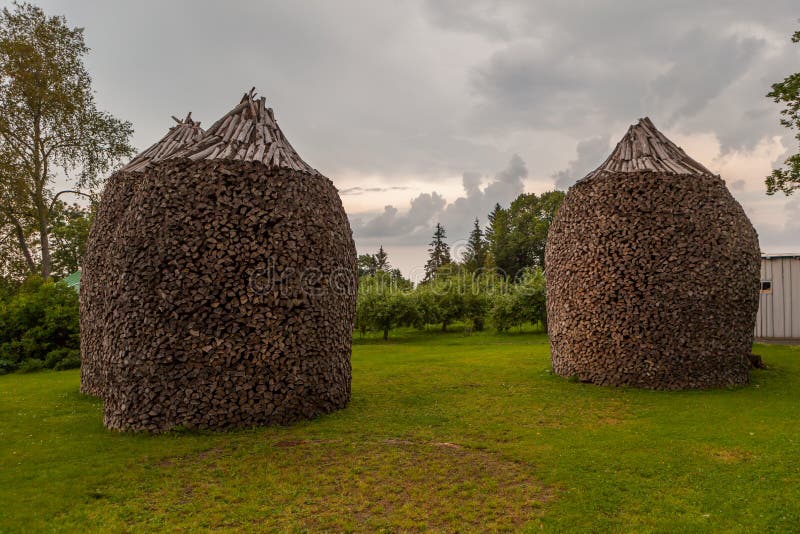 Stack of wood on a lawn stock photo. Image of sight, wood - 27611858