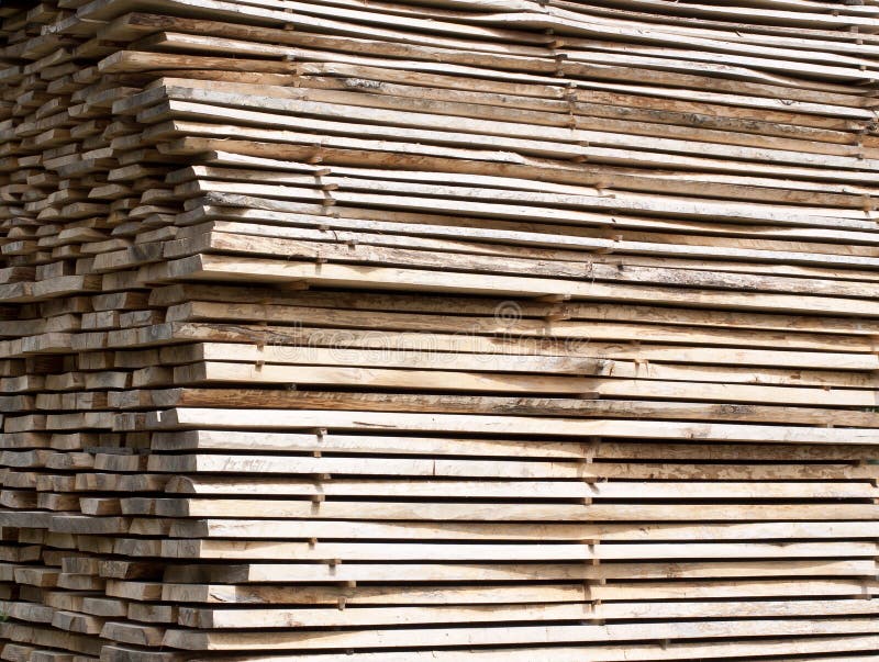 Stack of Wood Planks for Construction Buildings Stock Photo - Image of ...