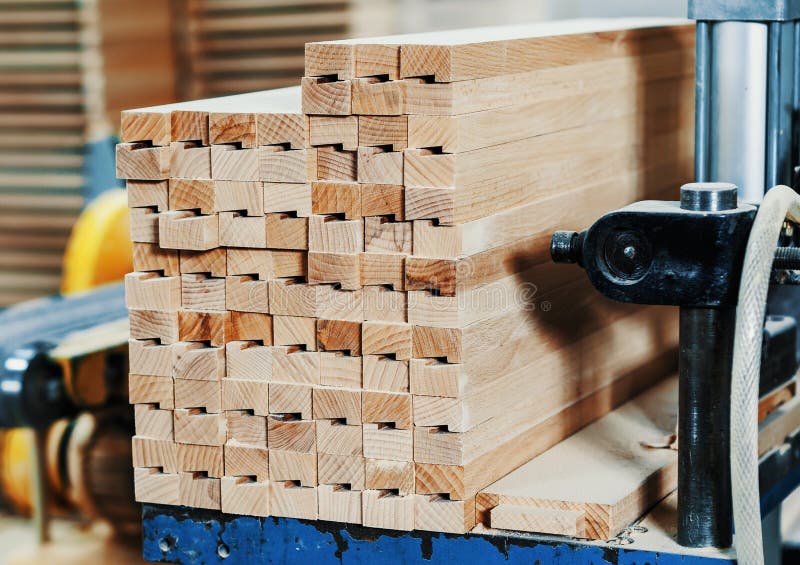 Stack of Wooden Bars in a Carpentry Workshop. Woodworking Industry ...