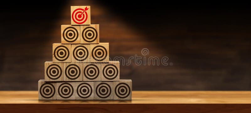 Stack of Wooden Blocks with Many Brown Targets and One Red One Stock ...