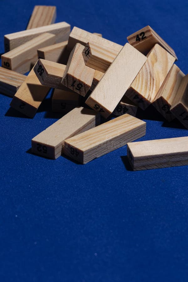 Stack of Wooden Blocks on Table in Classic Blue Color with Hard Light ...