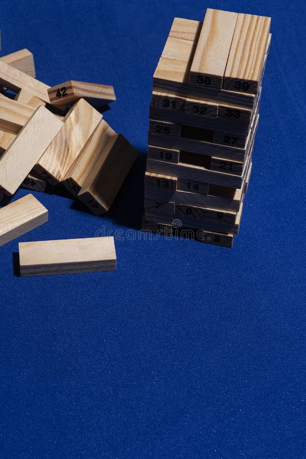 Stack of Wooden Blocks on Table in Classic Blue Color with Hard Light ...