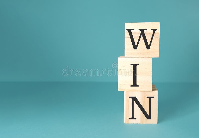 Stack of Wooden Blocks with the Word WIN Written on Them Stock Image ...