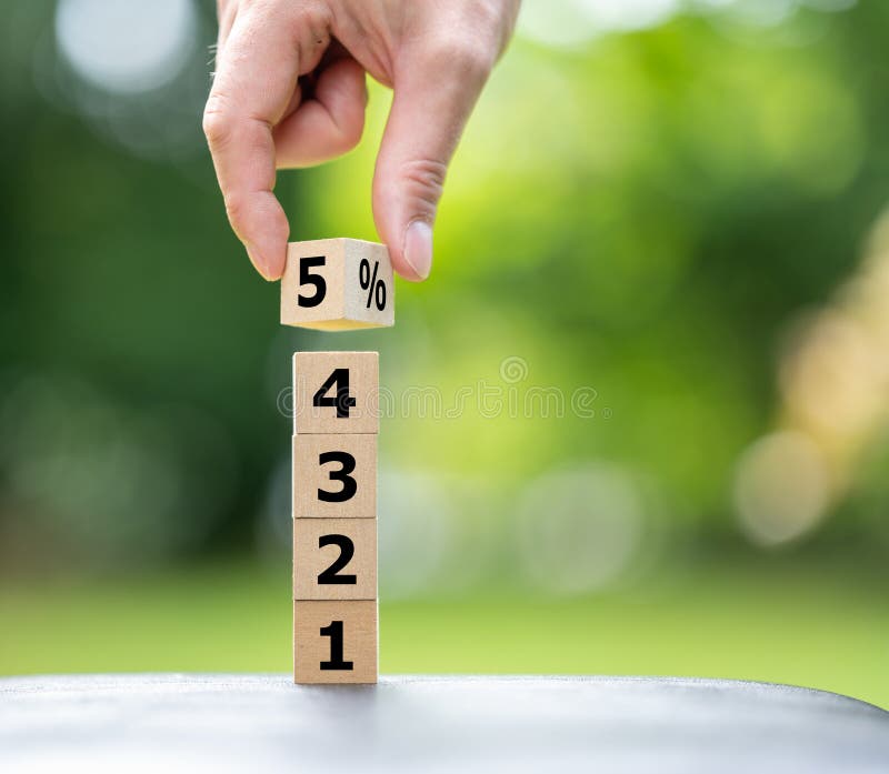 A Stack of Wooden Cubes Indicates the Label 5 Percent. Stock Photo ...