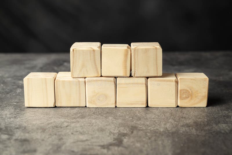 Stack of wooden cubes stock image. Image of idea, space - 301926675