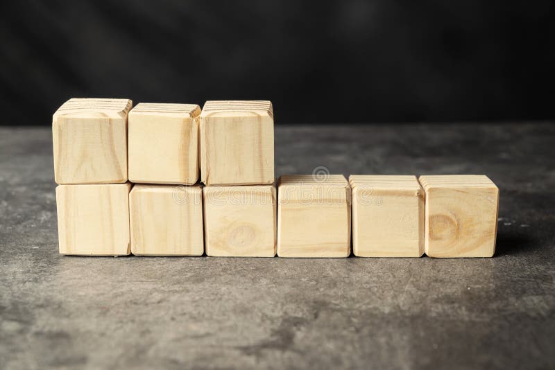 Stack of wooden cubes stock photo. Image of concept - 301926682