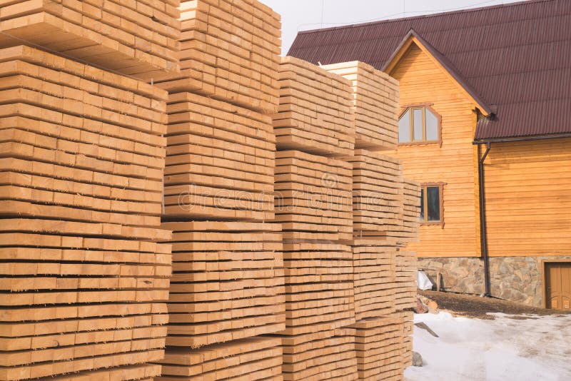 Stack of Wooden Material for Building. New Big Wooden House Stock Image ...