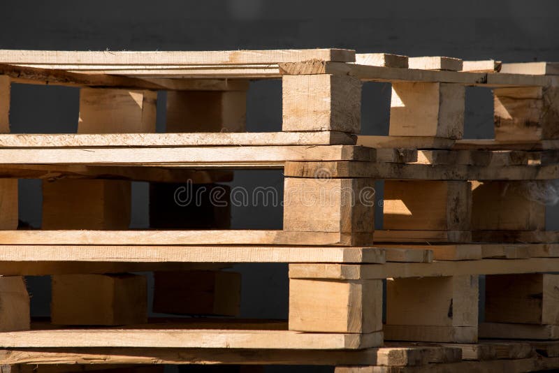 A Stack of Wooden Pallets is Close Stock Photo - Image of logistic ...