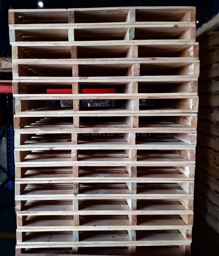 Stack of Wooden Pallets stock photo. Image of pallet - 227191444