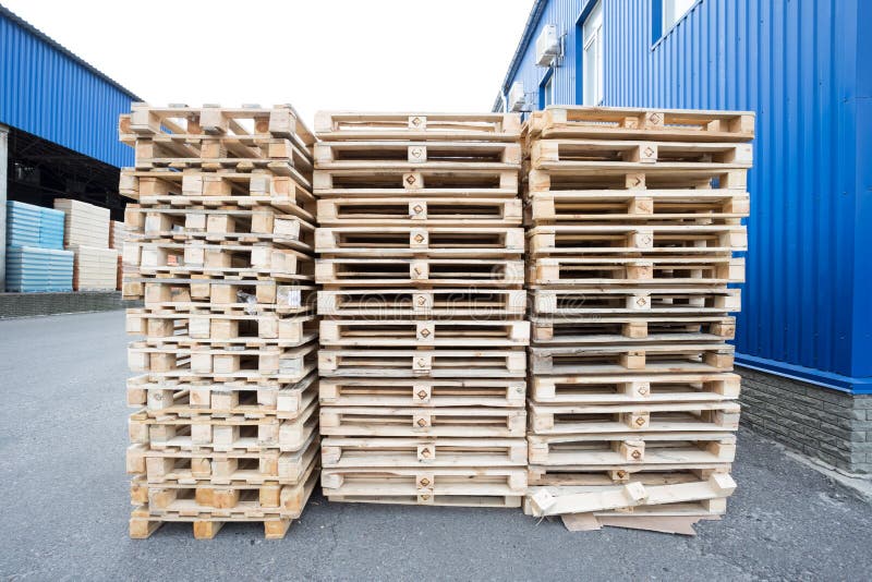 Stack of Wooden Pallets in Stock Stock Image - Image of industry ...