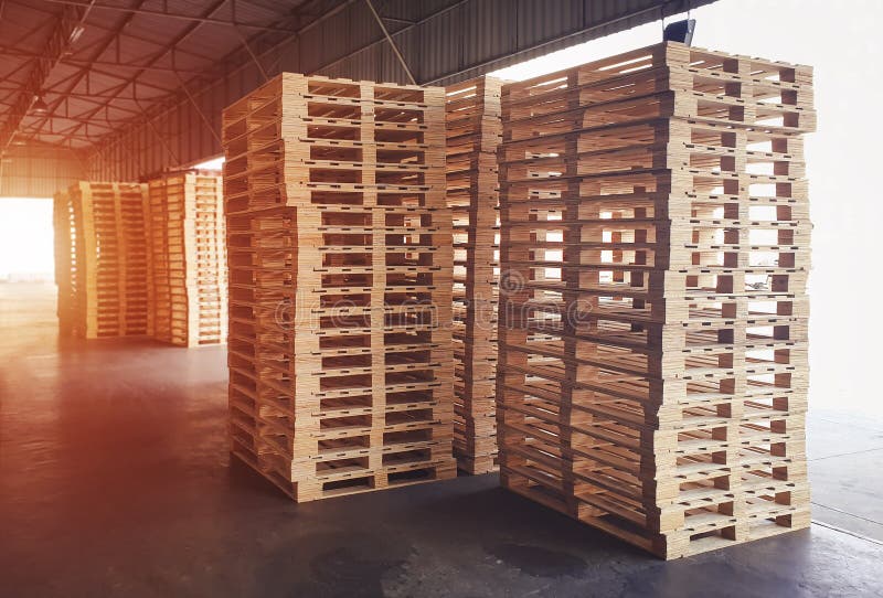 Stack of Wooden Pallets in Storage Warehouse Stock Photo - Image of ...