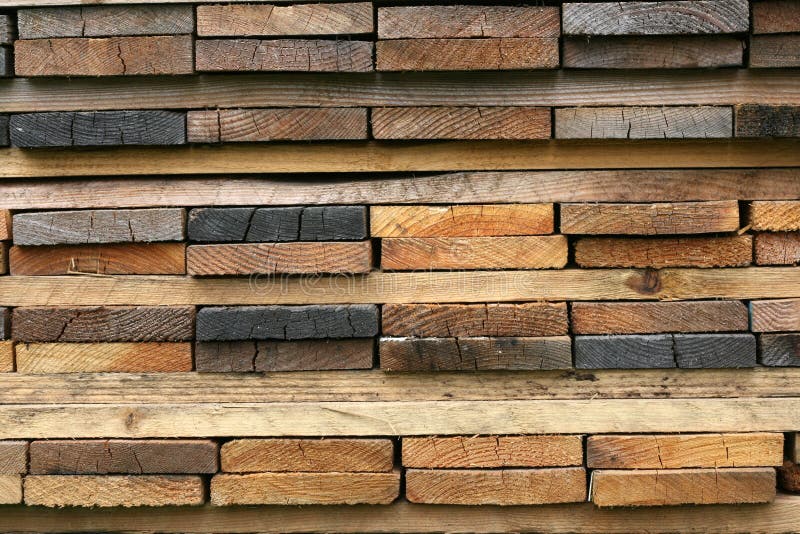 Stack of wooden planks stock image. Image of construction - 40331439