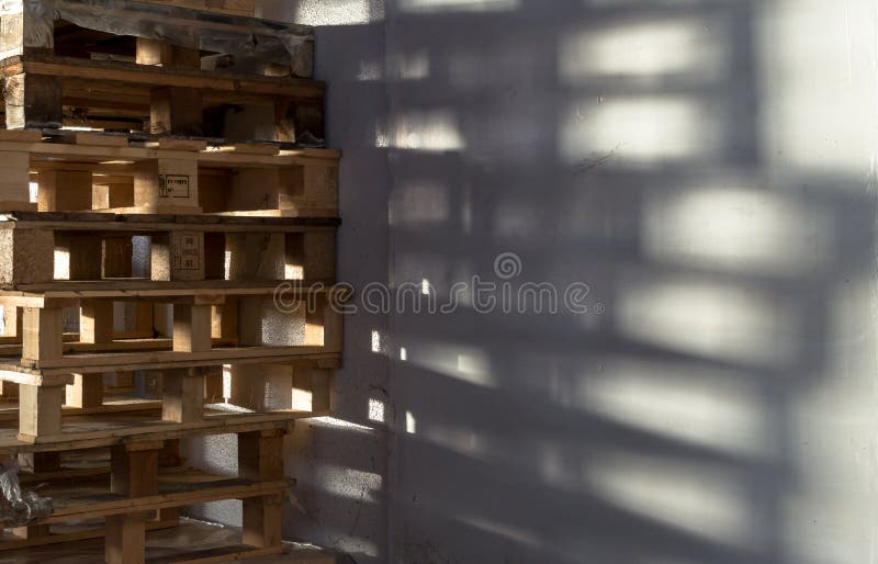 Stack of Wooden Storage Pallets Stock Image - Image of sunlight ...