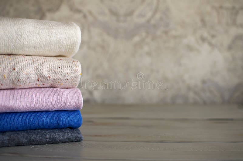 A Stack of Woolen Things on the Table Stock Photo - Image of pile ...