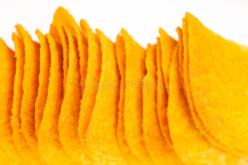 A stack of yellow chips stock photo. Image of snack - 365921256