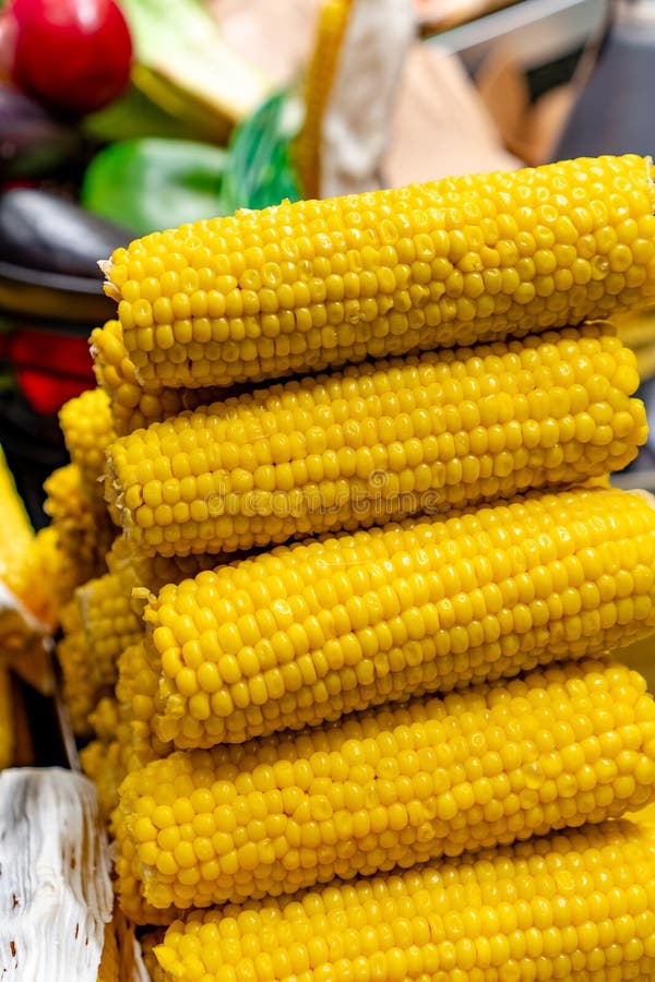 A Stack of Yellow Corn on a Table Stock Image - Image of apples ...