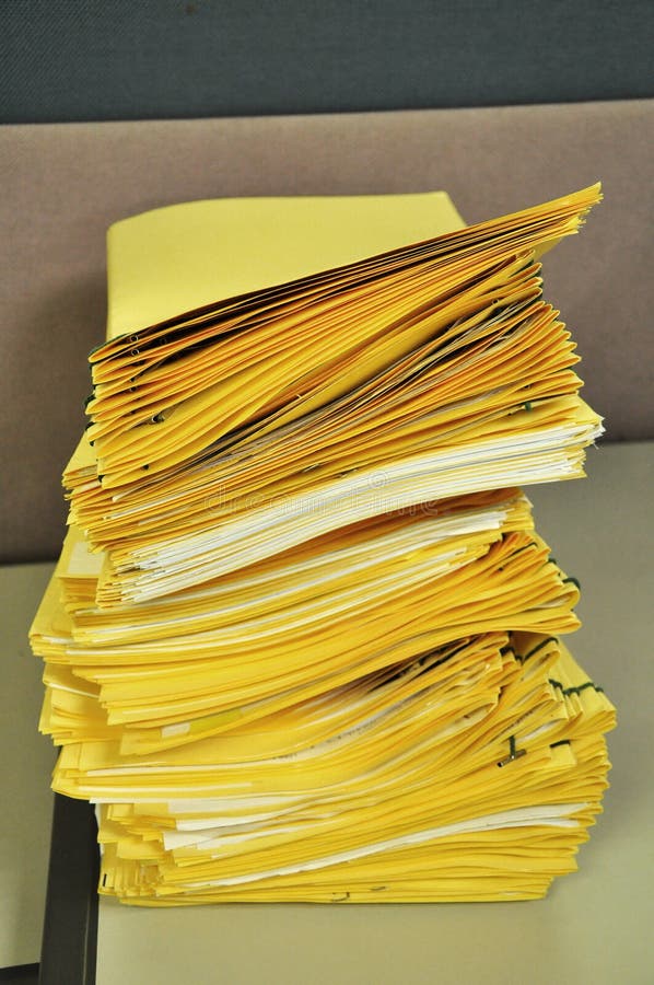 Stack of Yellow Folders on the Table Stock Image - Image of orange ...