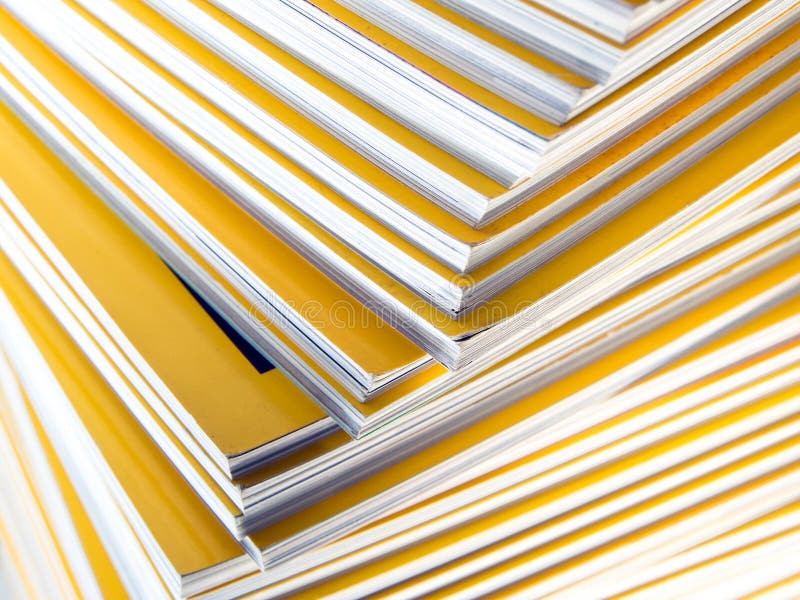 Stack of Yellow Monthly Magazine Stock Photo - Image of paper, yellow ...