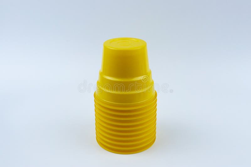 Stack of Yellow Plastic Cups Isolated on White Background Stock Photo ...
