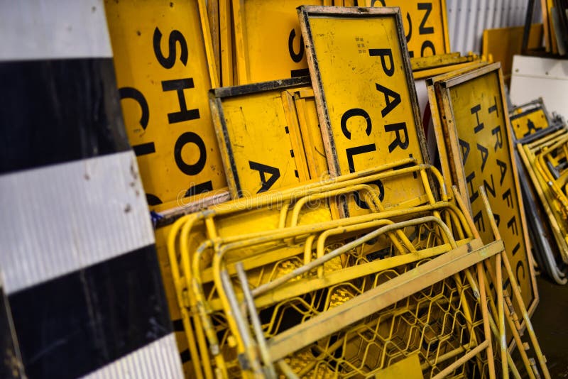 A Stack of Yellow Traffic Hazard Signs Stock Photo - Image of safety ...