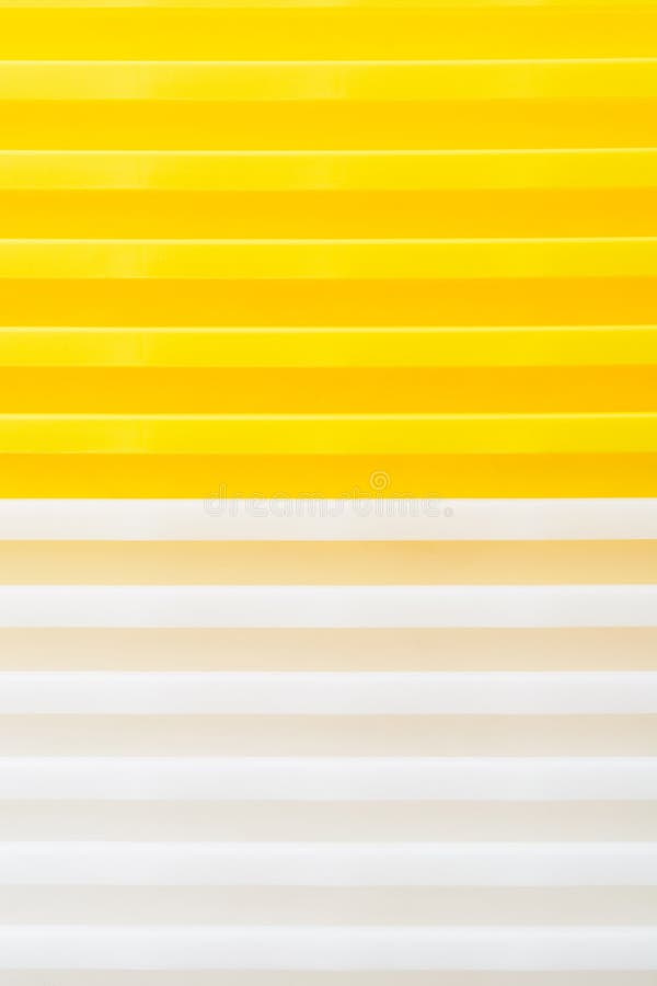 Stack of Yellow and White Recycled Plastic Containers. Duocolor ...