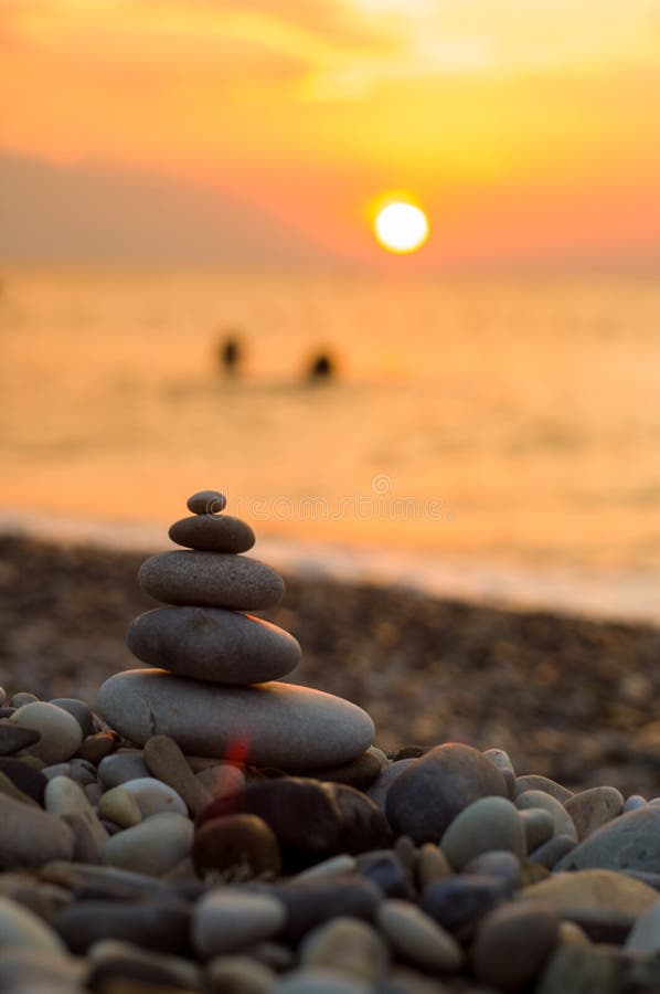 Stack of Zen Stones on Pebble Beach Stock Photo - Image of balance ...