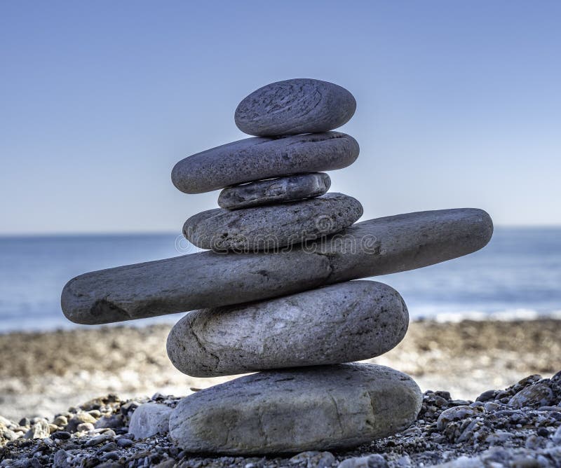 Stack of Zen Stones on Pebble Beach Stock Photo - Image of landscape ...