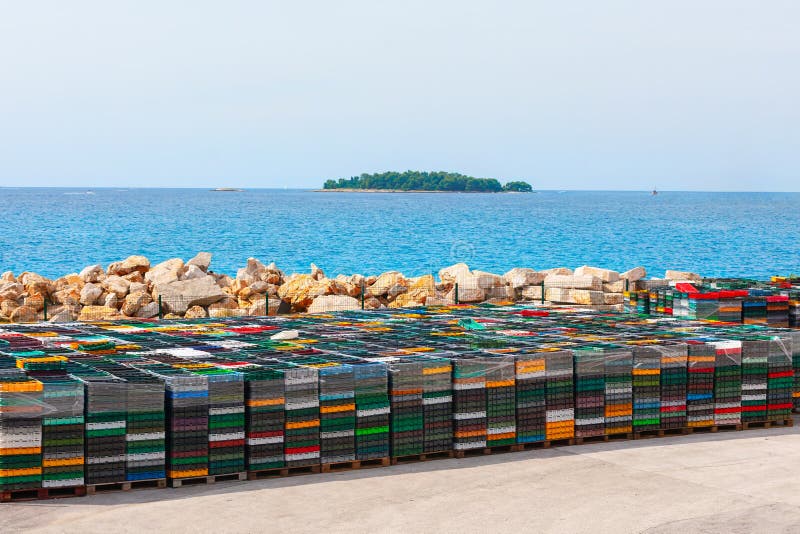 Stackable Plastic Storage Containers at the Coast Stock Photo - Image ...
