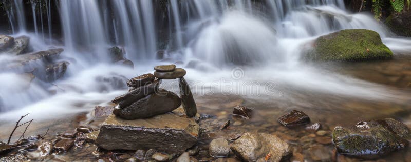 Stacked Balanced Rocks on Mountain River Waterfall Stock Image - Image ...