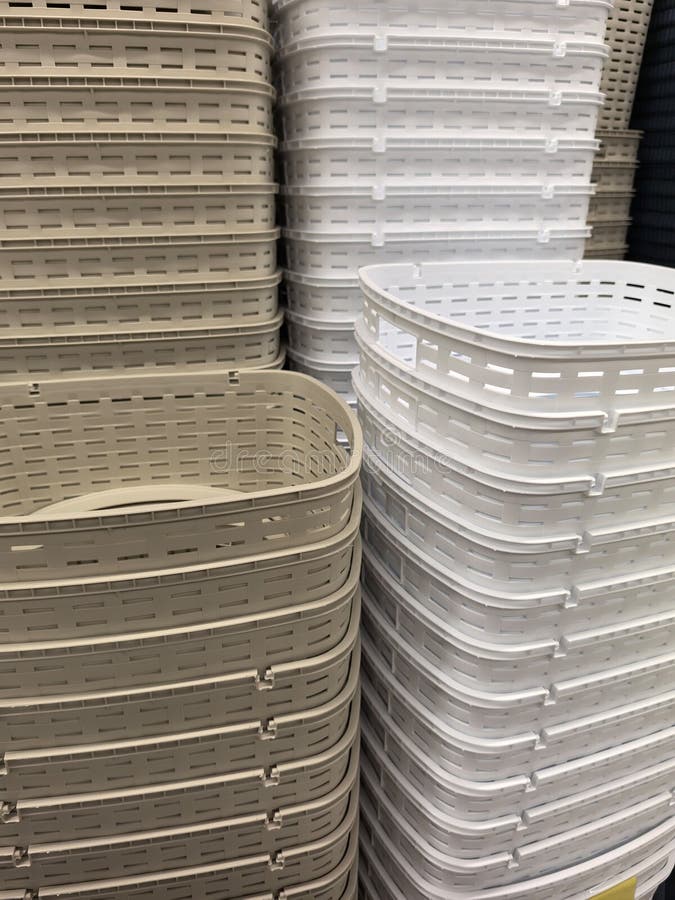 Stacked Baskets in Neutral Tones Create a Minimalist Storage Solution ...