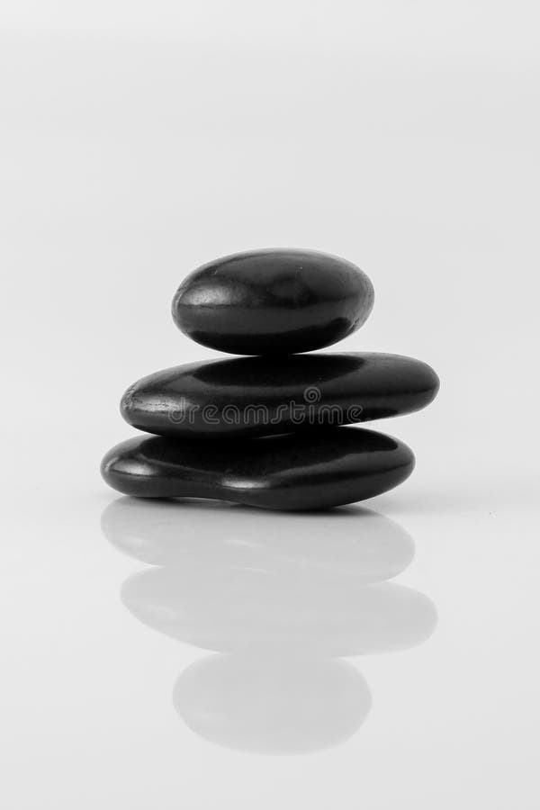 Stacked Black Stones on White Background Stock Image - Image of stones ...