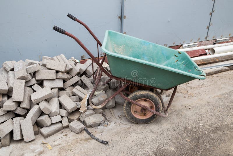 Brick Mason's Wheelbarrow stock image. Image of insurance - 30402203