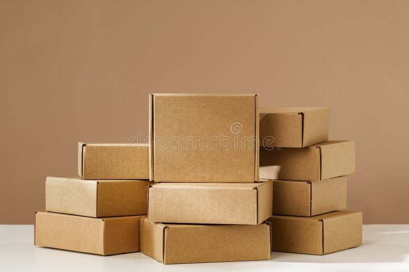 Stacked Brown Cardboard Boxes on White Surface Close Up Stock ...