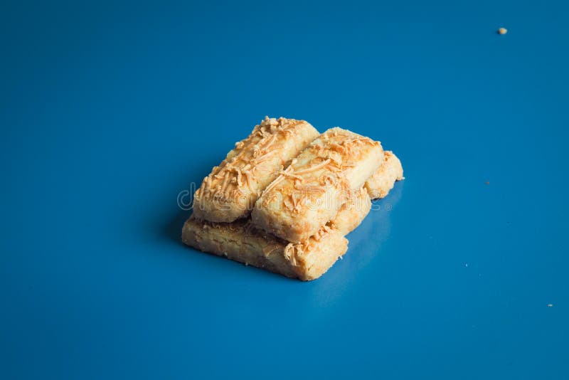 Stacked Butter Cookies on Blue Background Stock Photo - Image of ...