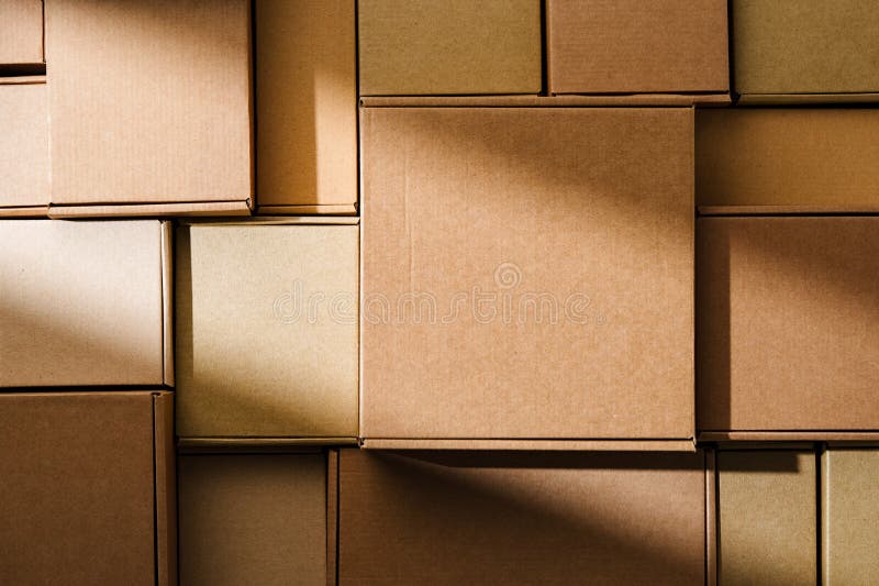 Stacked Cardboard Boxes Arranged in a Neat Pattern Under Natural Light ...