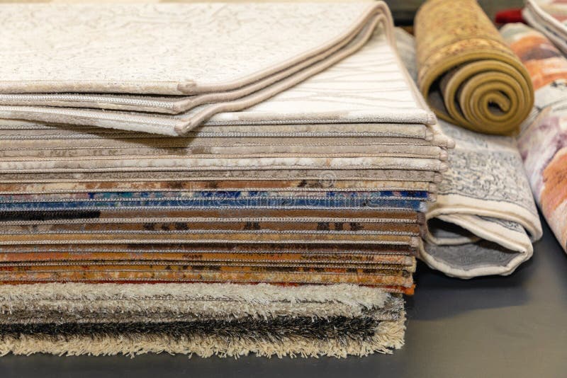Stacked Carpets Rugs stock image. Image of selection - 197378549