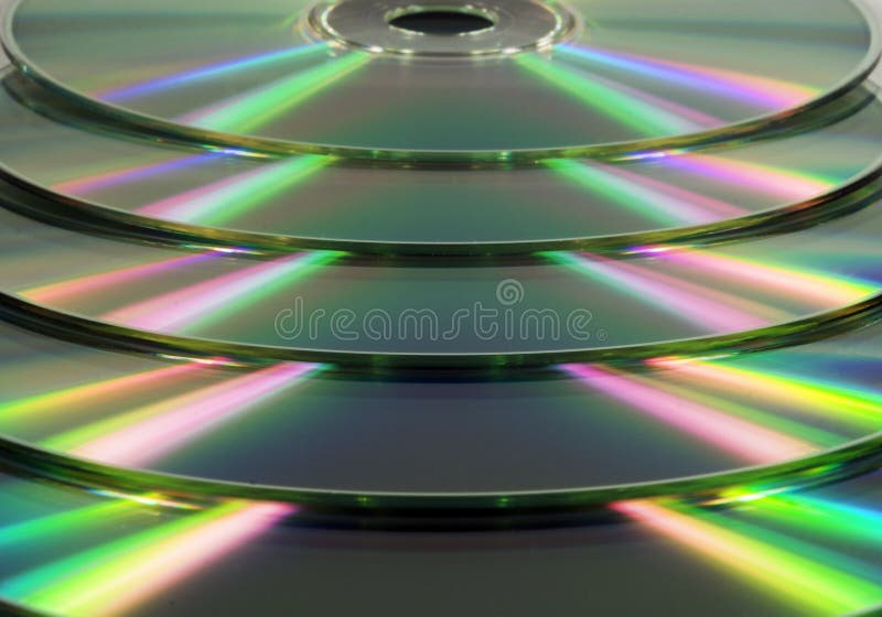 Stacked CD/DVD s stock photo. Image of audio, colored, rainbow - 551528