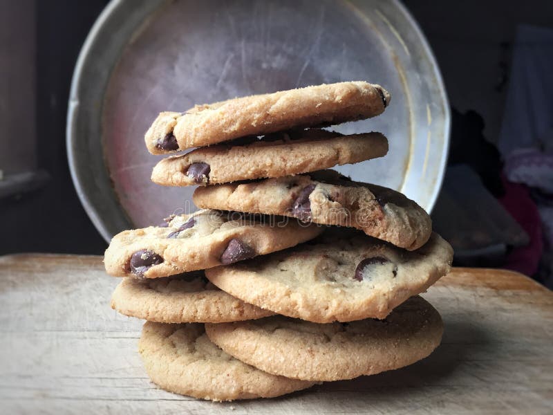 Stacked Chocolate Chip Cookies Stock Photo - Image of rustic, metal ...