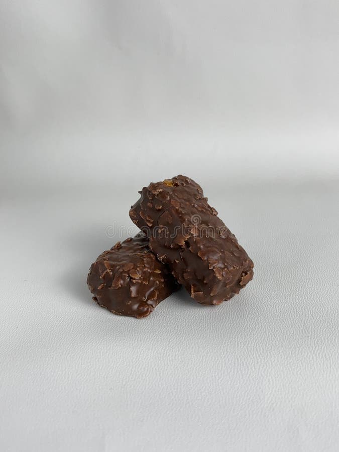 Stacked Chocolate-Coated Wafer Bites on a White Background Stock Image ...