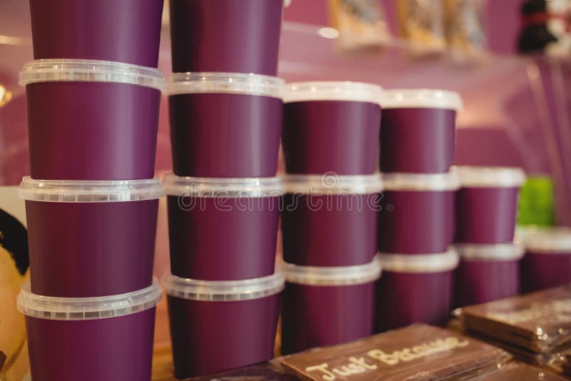 Stacked Chocolate Containers in Display Stock Photo - Image of stacked ...