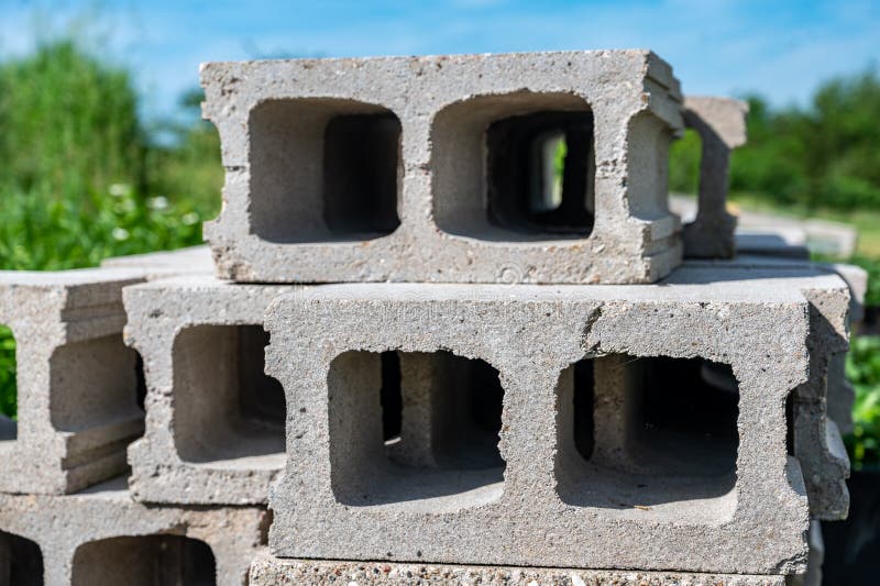 Stacked Cinder Blocks Laying so that the Other Side is Visible through ...