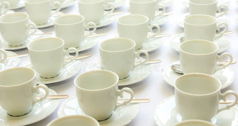 Stacked Coffee Cups with Saucers and Spoons Stock Image - Image of ...